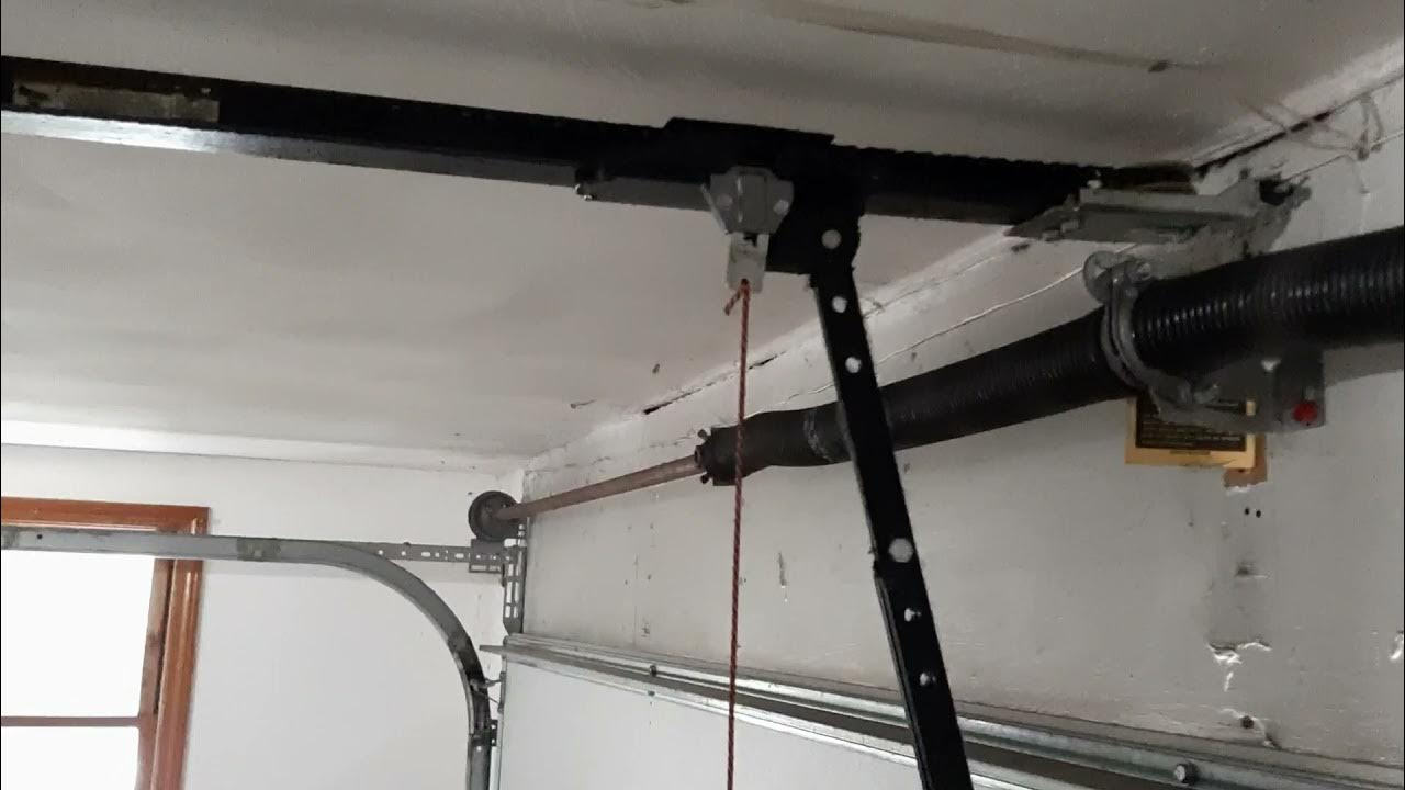 How To Reengage Door On 7055 Genie Garage Door Opener: Step-By-Step Guide